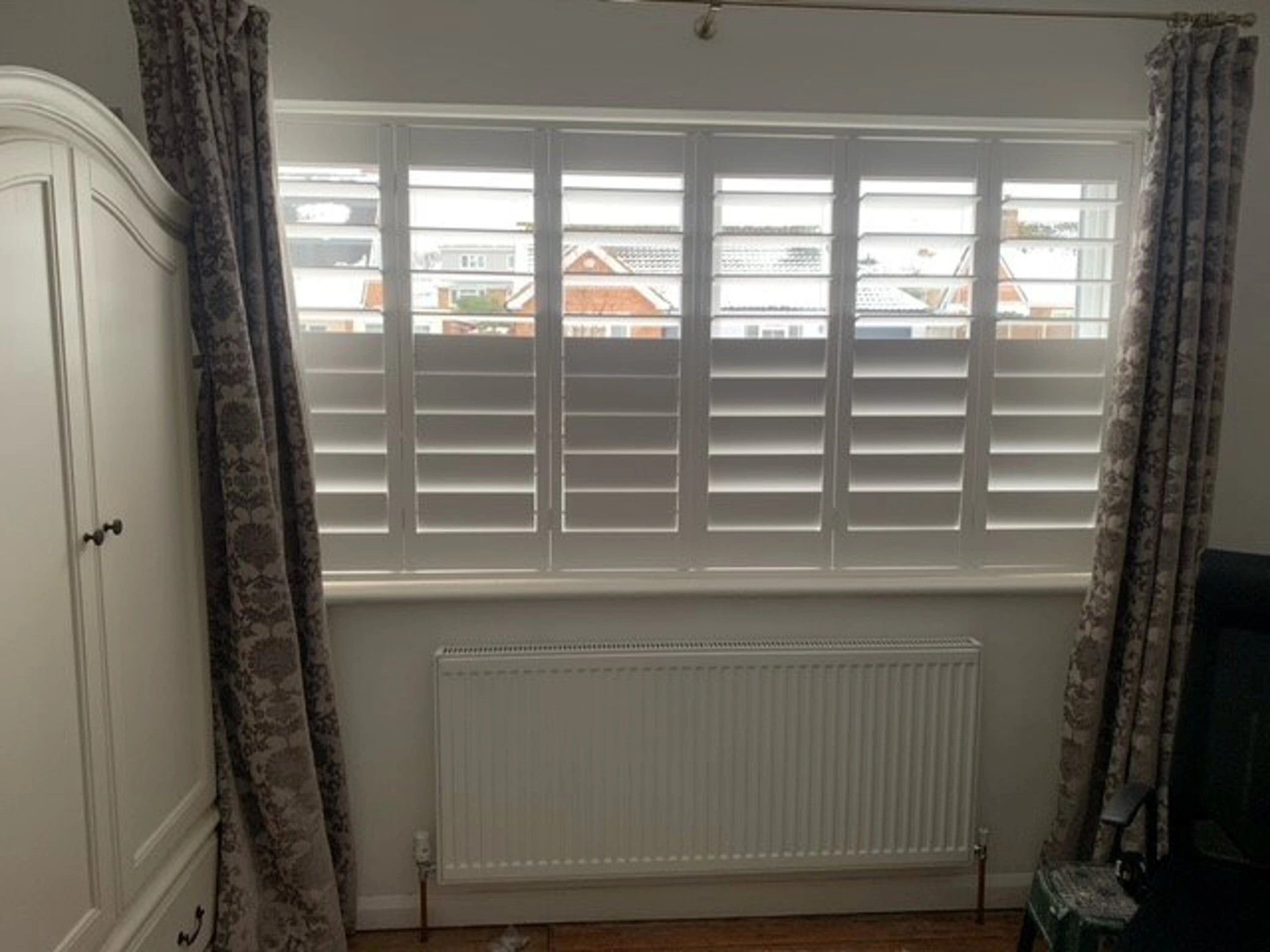 Combining Shutters With Curtains
